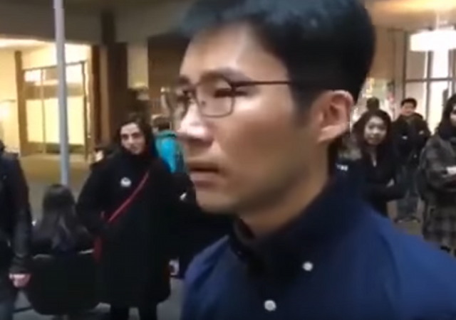 U. Washington student | shuts down protest | in library