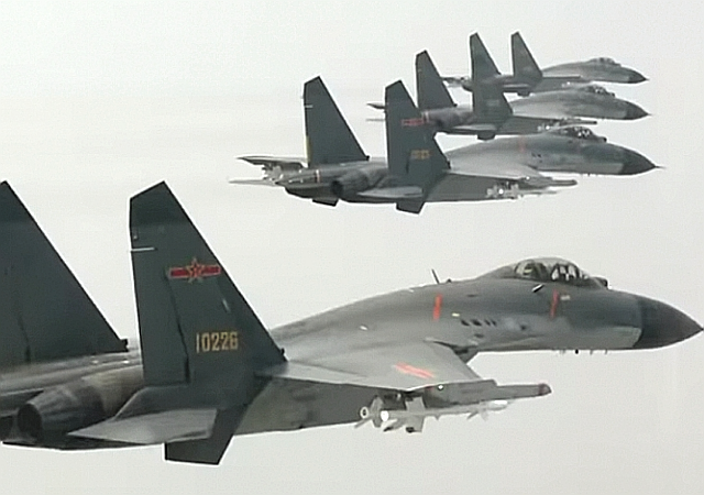 Chinese Warships ‘Encircle’ Taiwan and Bombers Breach Air Defense Zone ...