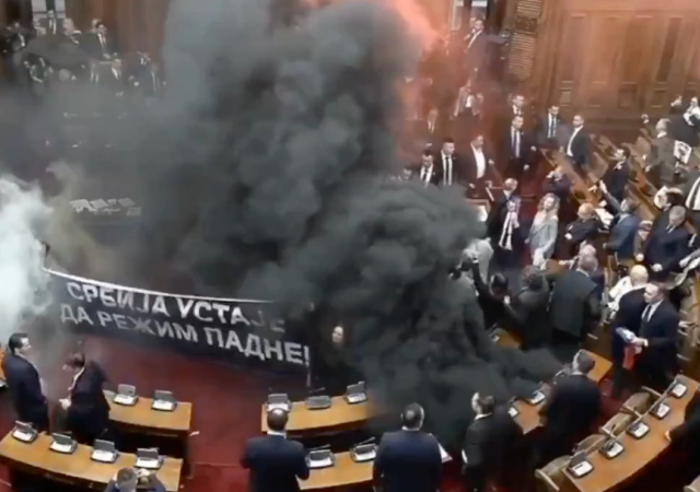 Chaos Erupts as Serbian Parliament Members Throw Smoke Bombs, Flares